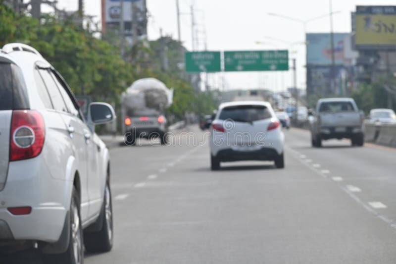 Highway Traffic with Safety Barrier on Road Asphalt, Blurred Image ...