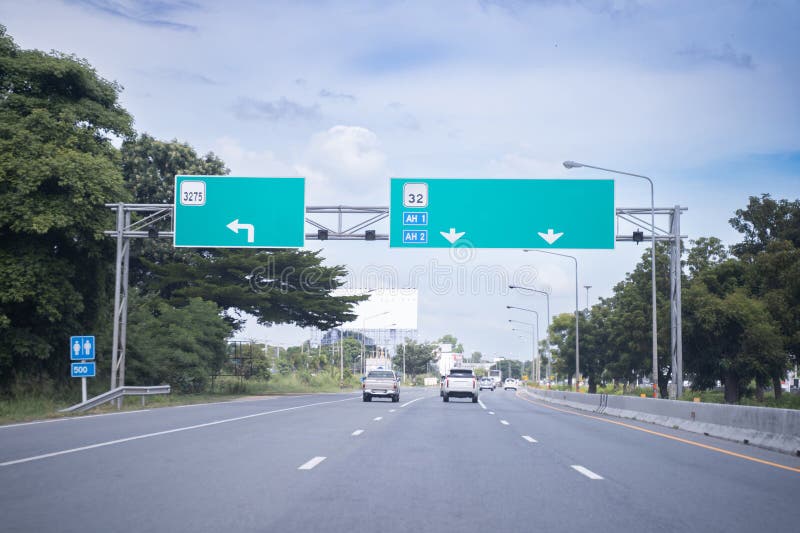 Highway with Traffic Signs with Road Signs ,Road Trip Concept Editorial ...
