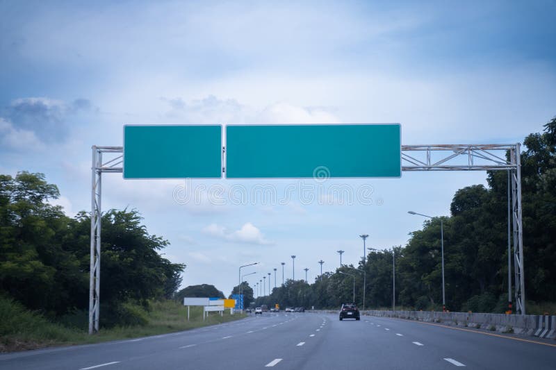 Highway with Traffic Signs with Road Signs ,Road Trip Concept Editorial ...