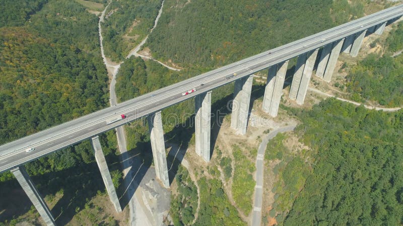 Aerial View of Heavy Truck Traffic Under Highway Viaduct Bridge Stock ...