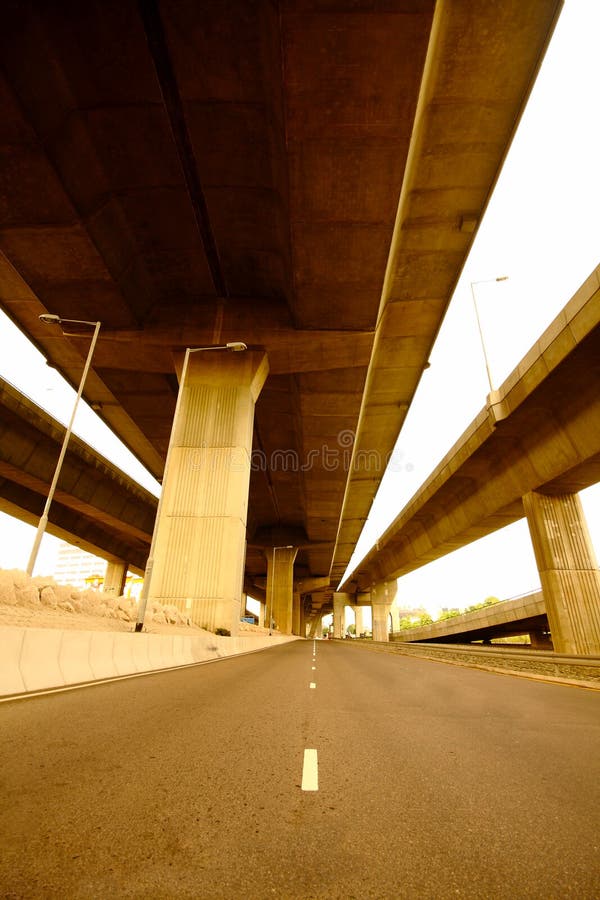 Highway under the bridge stock photo. Image of motion - 16580874