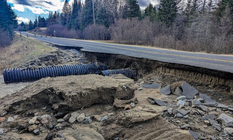 Highway Washed Out from a Broken Beaver Dam Stock Photo - Image of ...