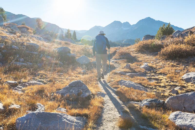 Hike in autumn season stock photo. Image of larch, mountains - 261393280