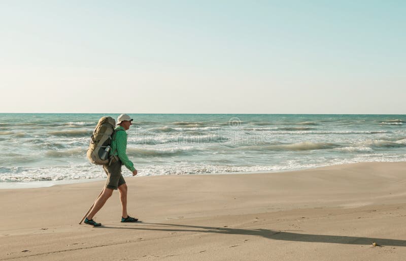 Hike on the beach stock photo. Image of hiker, outdoor - 260002504