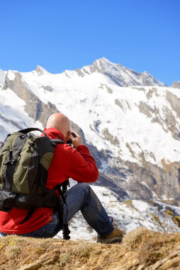 Hiker with Camera and Backpack Taking Picture of Beautiful Mount Stock ...