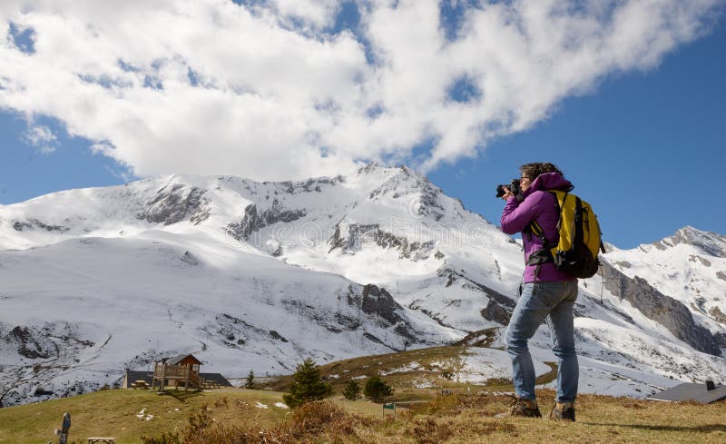 Hiker with Camera and Backpack Taking Picture of Beautiful Mount Stock ...