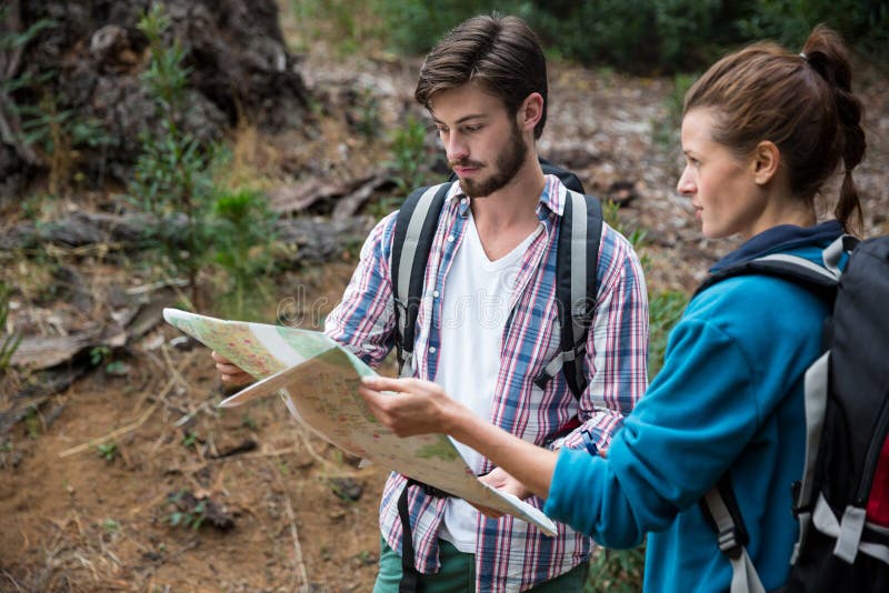 Hiker Couple Looking at Map and Compass Stock Photo - Image of hiker ...