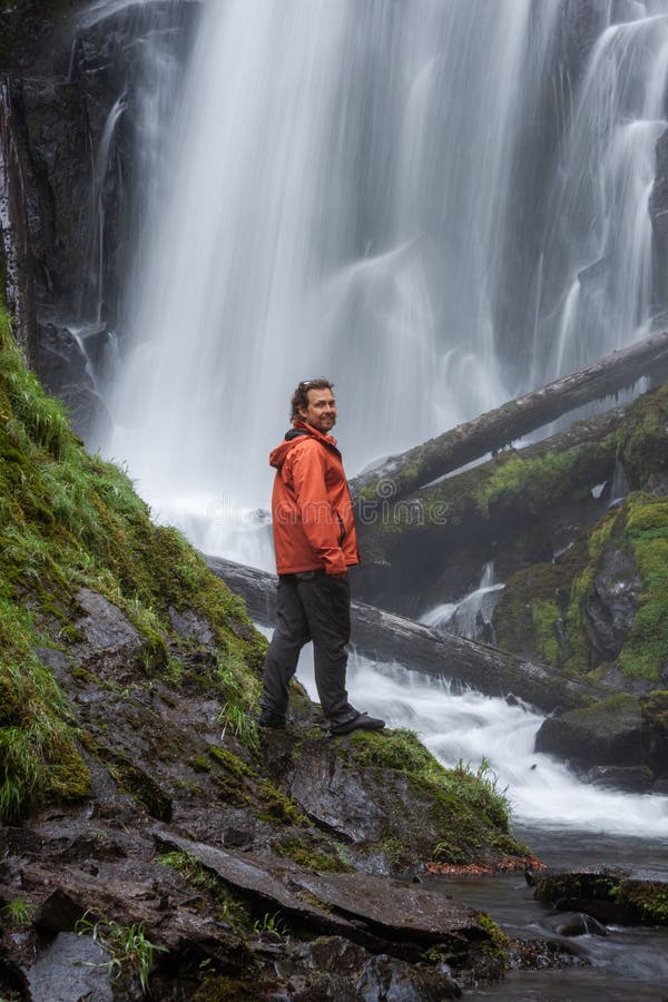 Hiker Enjoying the Waterfall Up Close. Stock Photo - Image of land ...