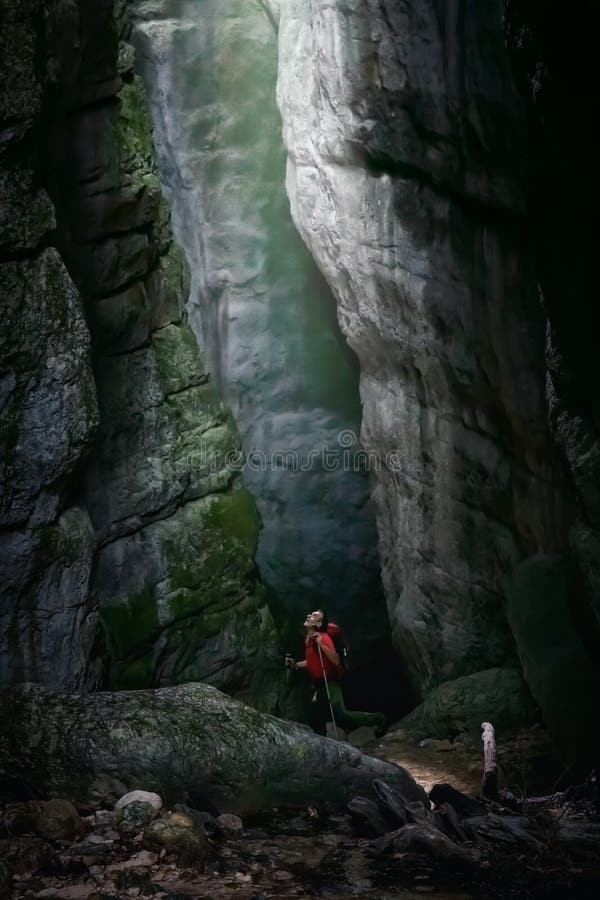Hiker in the Gorge Surrounded by Ancient Rocks Stock Image - Image of ...