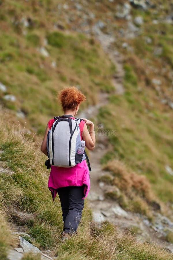 Hiker lady with camera stock image. Image of rucksack - 158640301