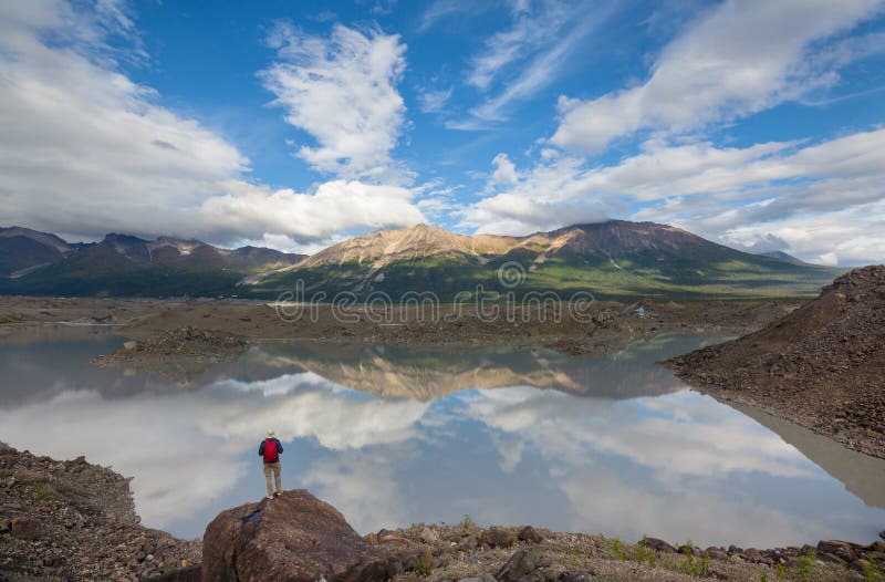 Hiker on lake in Alaska stock image. Image of outdoor - 255241463