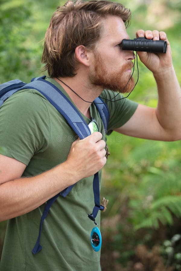 Hiker Looking through Binoculars in Nature Stock Image - Image of ...