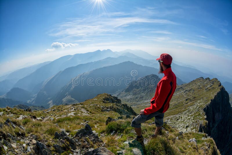 Hiker Looking Over the Mountain Ridges Stock Image - Image of ridge ...