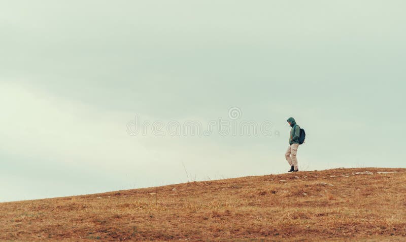 Hiker Man Walking Down on the Hill Stock Image - Image of hike, outdoor ...