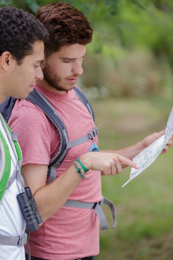 Hiker with Map Exploring Wilderness on Trekking Adventure Stock Image ...
