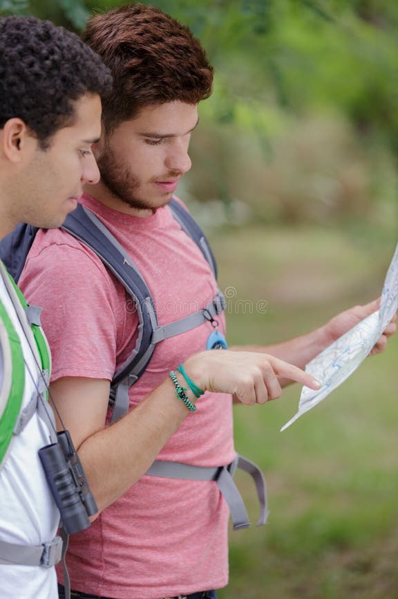 Hiker with Map Exploring Wilderness on Trekking Adventure Stock Image ...