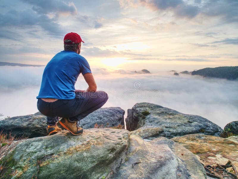 Hiker in Middle of Nowhere and Thinking Alone. Man Sit on Top Stock ...