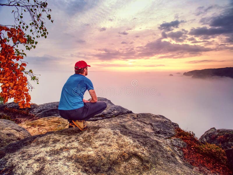 Hiker in Middle of Nowhere and Thinking Alone. Man Sit on Top Stock ...