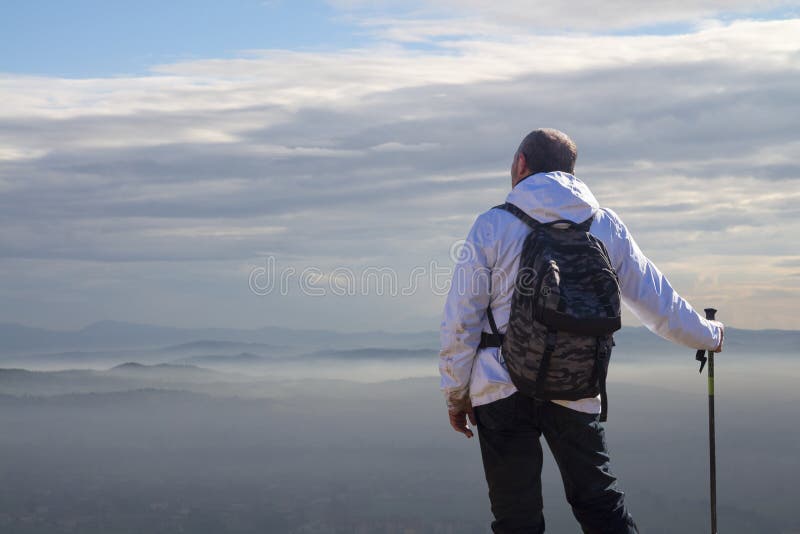 Hiker on mountain peak stock image. Image of national - 261666131