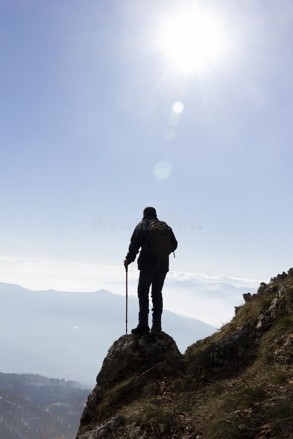 Hiker on mountain peak stock image. Image of hiking - 177200289