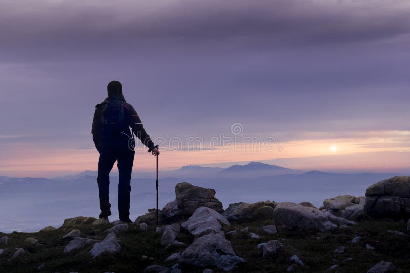 Hiker on mountain peak stock image. Image of hiking - 179052883