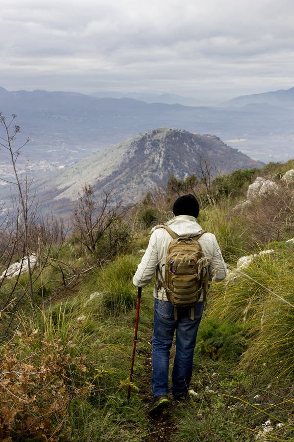 Hiker on mountain trail stock photo. Image of hike, trek - 115559286