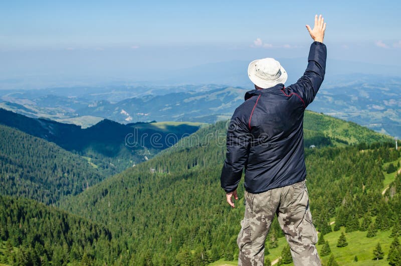 Hiker with raised arm stock photo. Image of back, people - 137733538