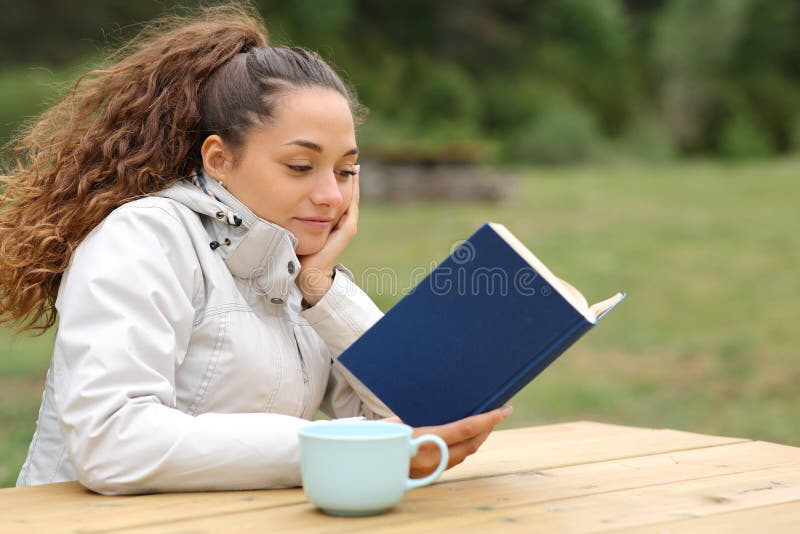 Hiker Reading a Book in a Table Stock Photo - Image of seller, enjoying ...