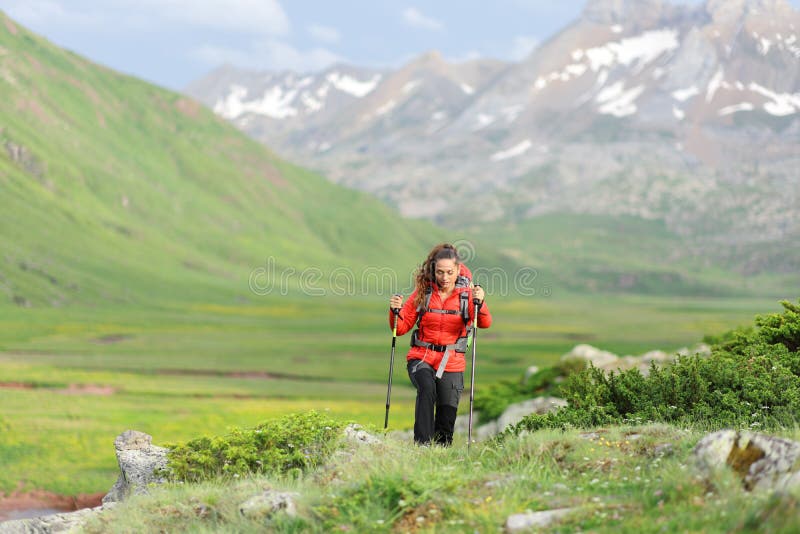 Hiker in Red Walking in a Beautiful Mountain Stock Photo - Image of ...