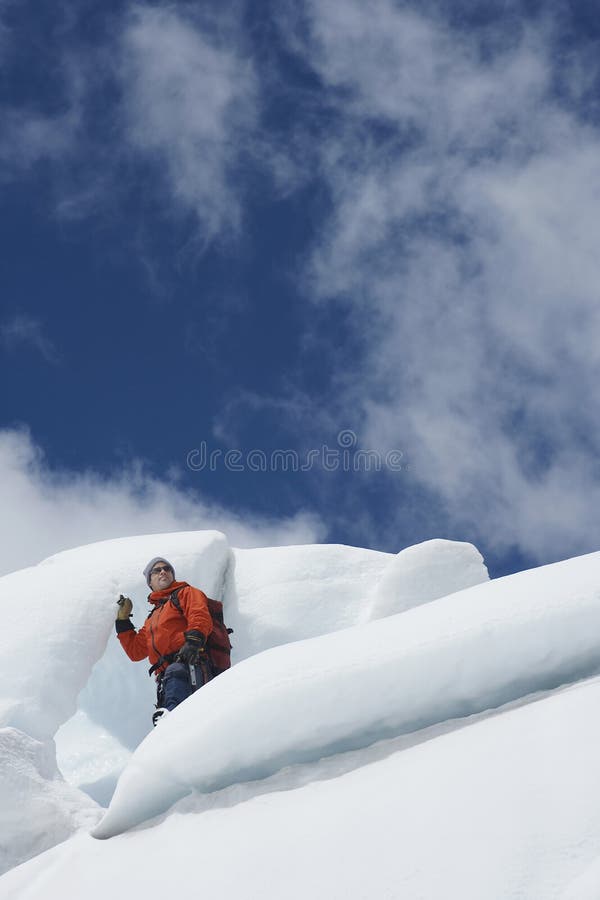 Hiker Standing on Ice Chunks Stock Image - Image of mountaineering ...