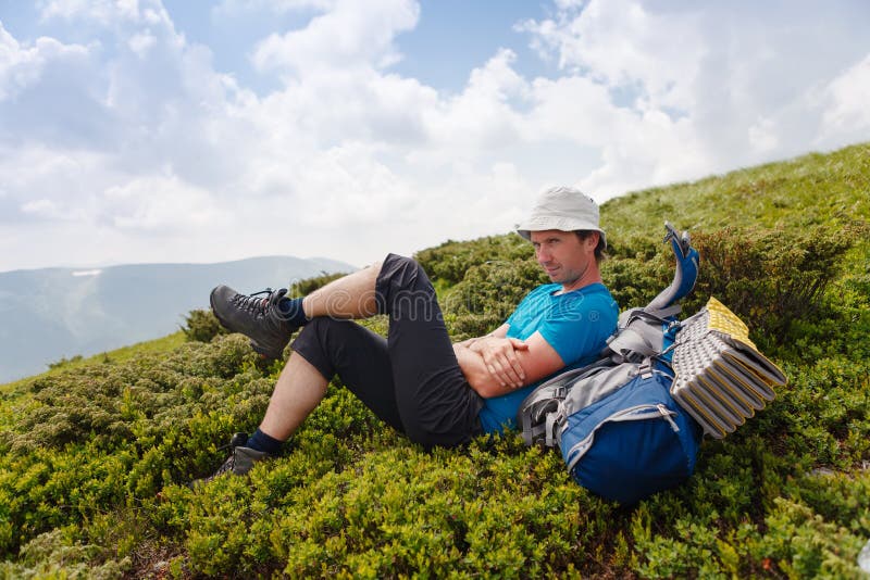 Hiker Takes Rest during Hiking Stock Photo - Image of caucasus, sports ...