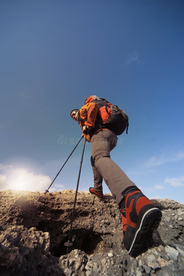 Hiker Trekking in the Mountains. Stock Image - Image of happy ...
