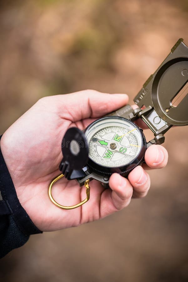 Hiker using compass stock photo. Image of geography, lost - 93294234