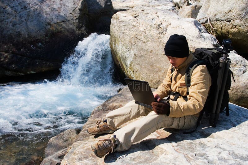 Hiker with laptop stock image. Image of computer, brook - 7073393