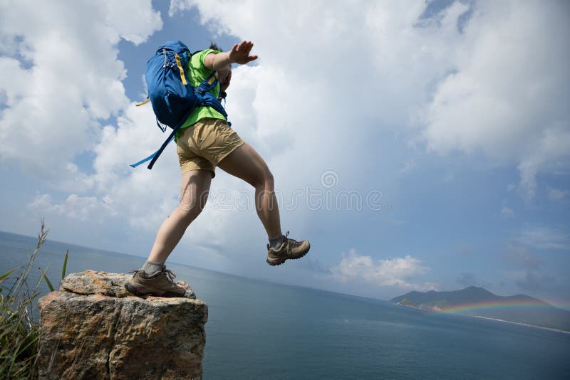 Woman walking off cliff stock photo. Image of adversity - 36511894