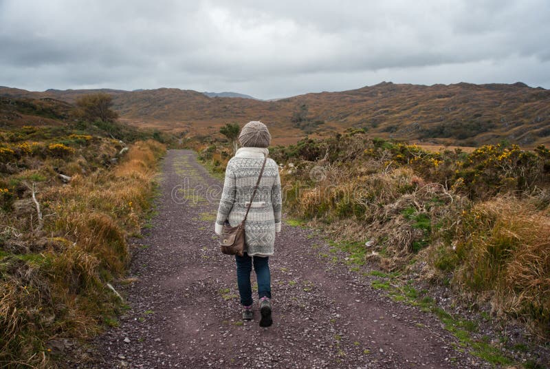 Hiker Walking through Rugged Wild Landscape Stock Photo - Image of ...