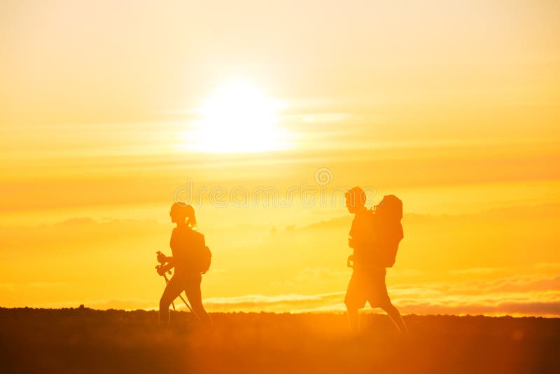 Hikers with Backpacks at Sunset Stock Photo - Image of success, rock ...