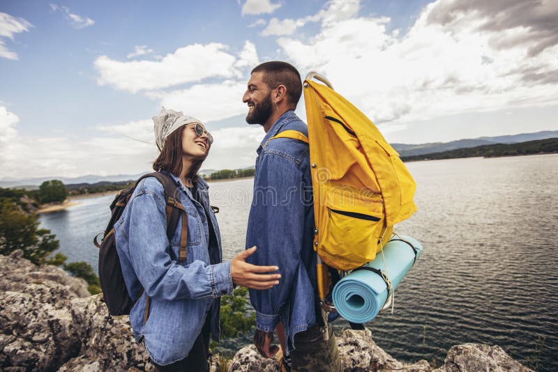 Hikers with Backpacks Walking Enjoying at the Mountain Lake Stock Image ...