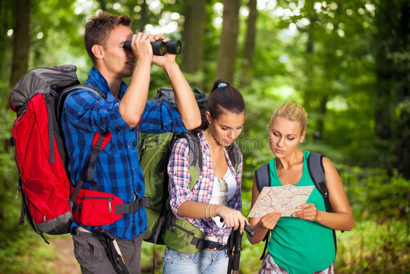 Hikers with Map and Binocular Stock Photo - Image of binocular ...