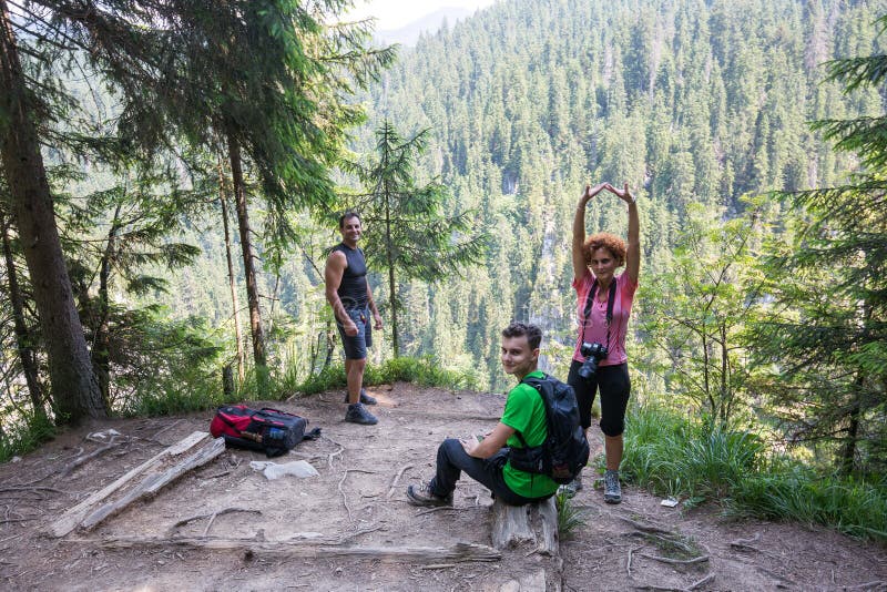 Hikers Taking a Break on a Mountain Peak Stock Photo - Image of hikers ...