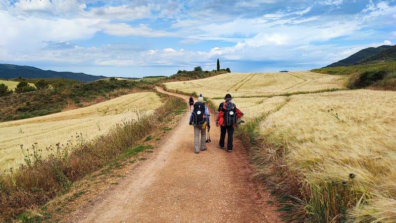 Hikers Walking on the Pathway in a Valley Stock Photo - Image of ...
