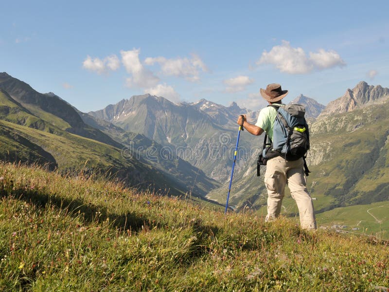Hiking in Alps stock photo. Image of outdoors, backpack - 16409892