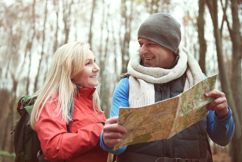 Hiking during the autumn stock image. Image of love, couple - 80939433