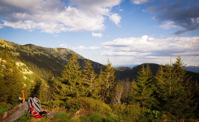 Hiking with a Backpack and an Ax in the Mountains Stock Image - Image ...