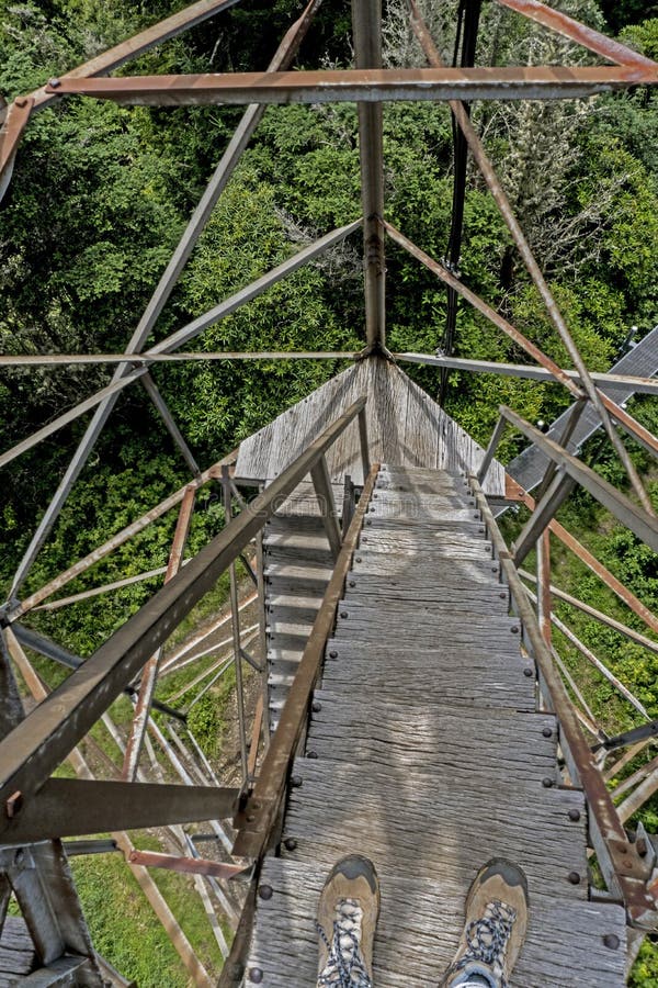 Hiking Boots Headed Down an Old Wooden Firetower. Stock Image - Image ...