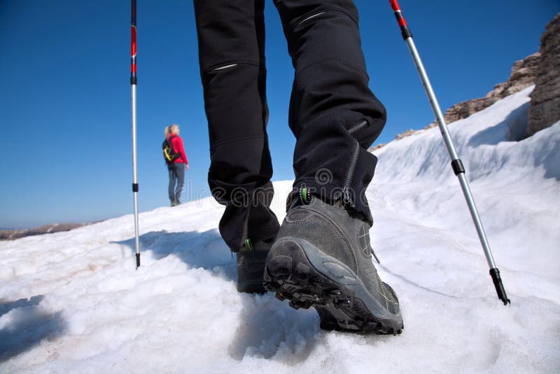 Hiking Boots on the Mountain Trail in the Snow Stock Photo - Image of ...