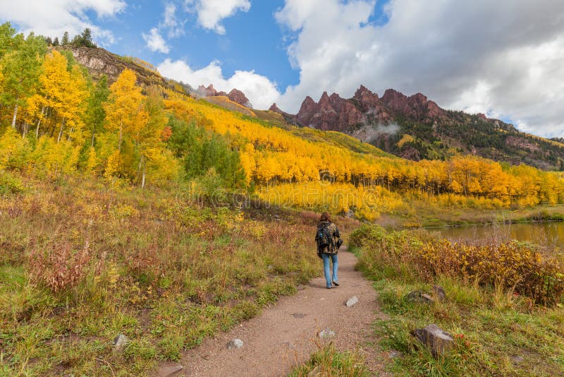Hiking Colorado in Fall stock photo. Image of trail, woman - 89904142