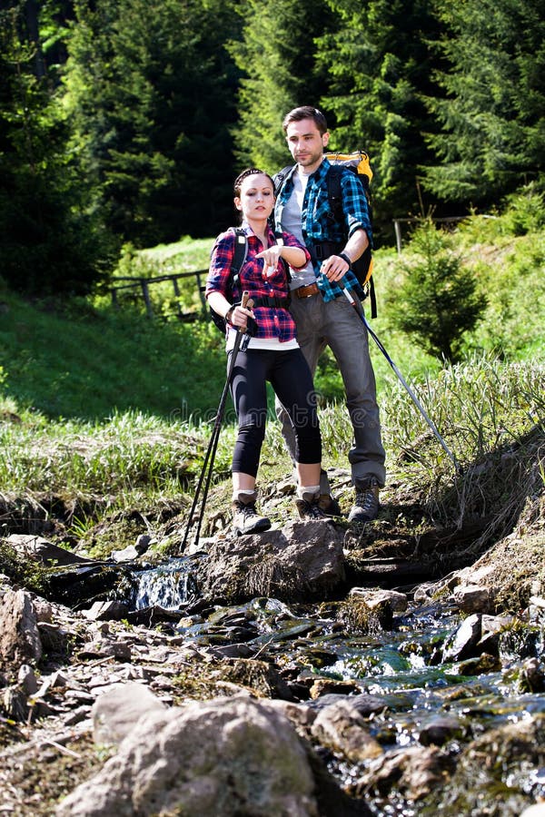 Hiking couple stock image. Image of nature, action, couple - 25184027