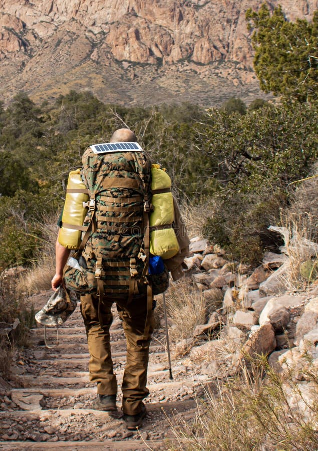 Hiking down the mountains. stock photo. Image of christianity - 169335854