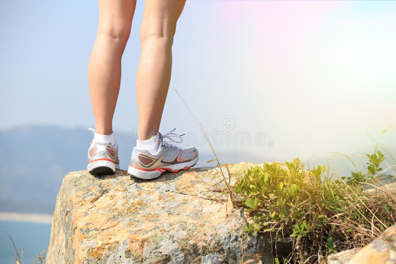 Hiking Feet Stand Seaside Rock Stock Photo - Image of sunlight ...